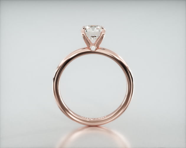 Solitaire Engagement Ring Embellished With a Four Prong Signature Head ...