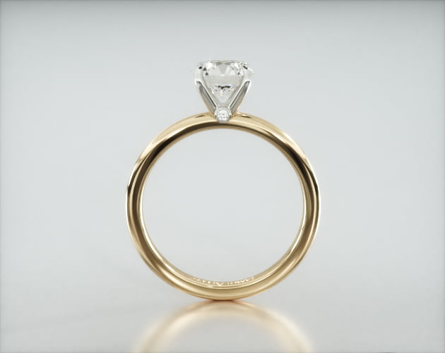 Solitaire Engagement Ring Embellished With a Four Prong Signature Head ...