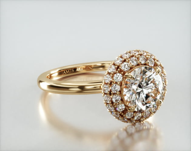 Solitaire Engagement Ring Embellished With a Falling Edge Pavé Halo ...
