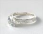 Platinum Engraved Channel Set Round Shaped Diamond Engagement Ring